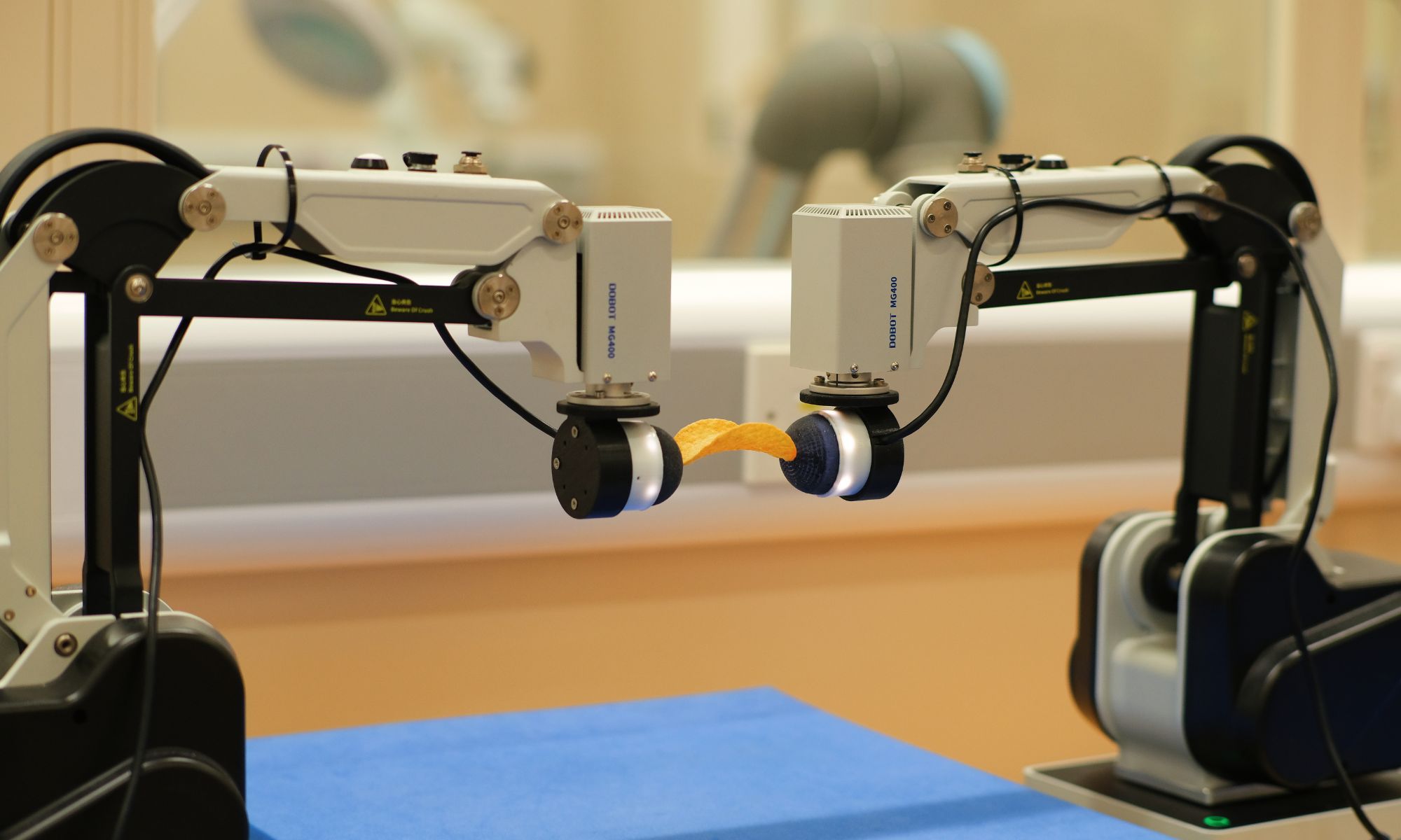 Two handed touchy-feely robot can pick a peck of pickled Pringles ...